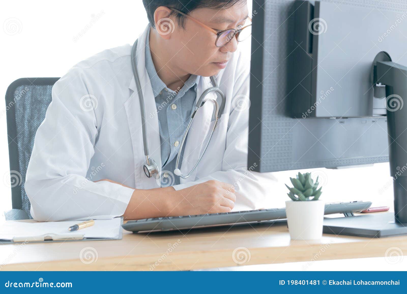 Worried Men Doctor Using Computer at Office Stock Image - Image of ...