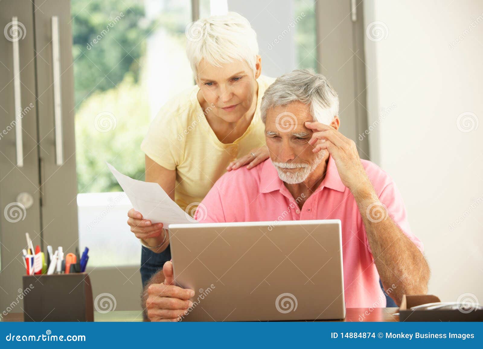 Worried Senior Couple Using Laptop at Home Stock Photo - Image of ...