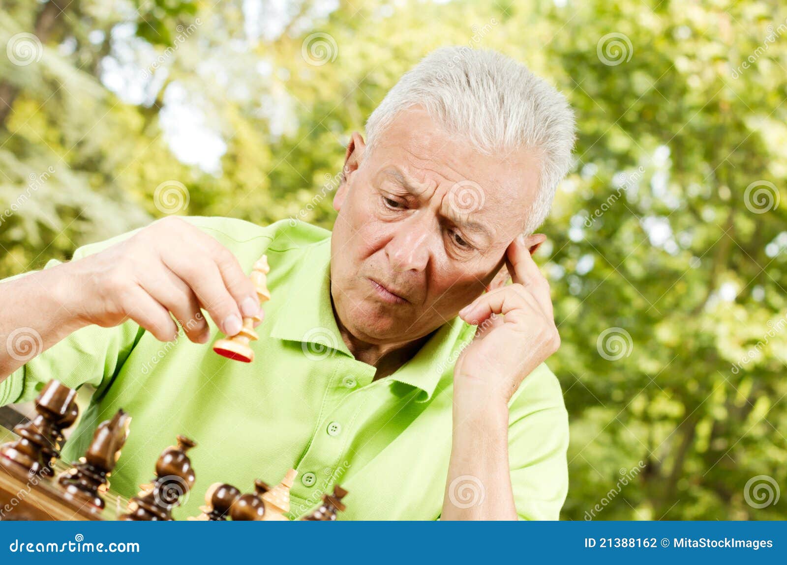 Worried Senior Man Playing Chess Stock Photo - Image of senior ...
