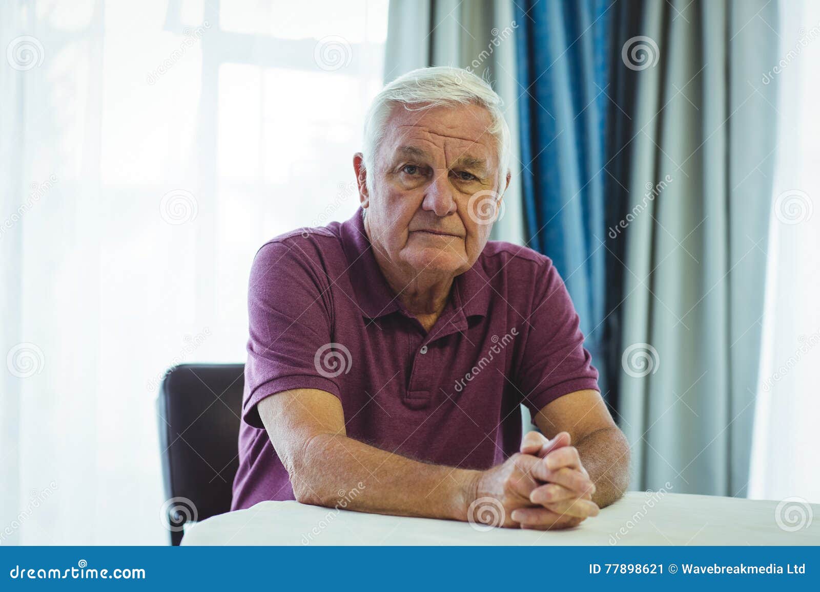 Worried Senior Man Sitting beside Table Stock Image - Image of hands ...