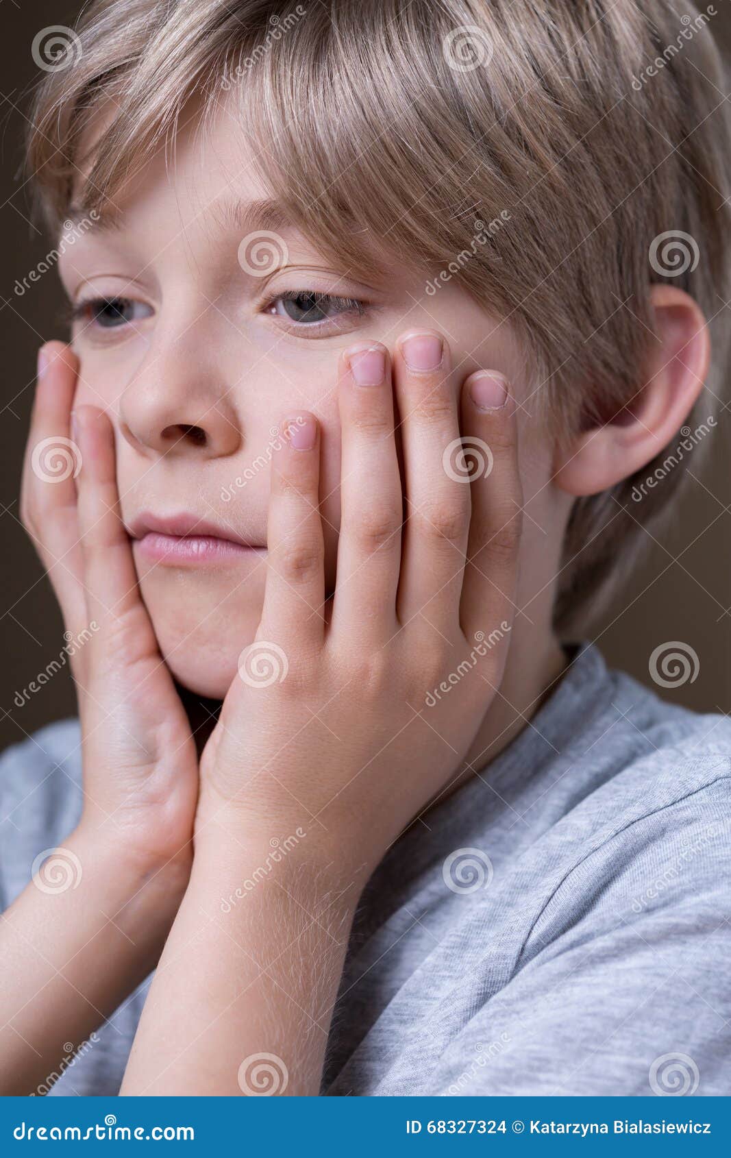 Worried young boy stock photo. Image of emotional, concerned - 68327324