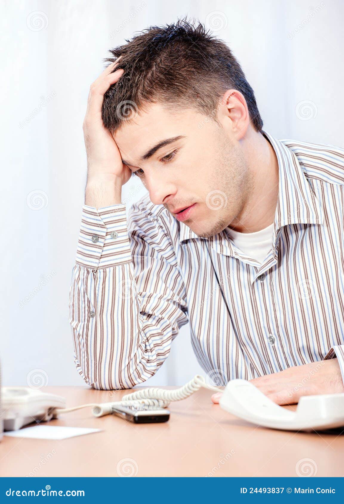Worried young business man stock image. Image of tired - 24493837