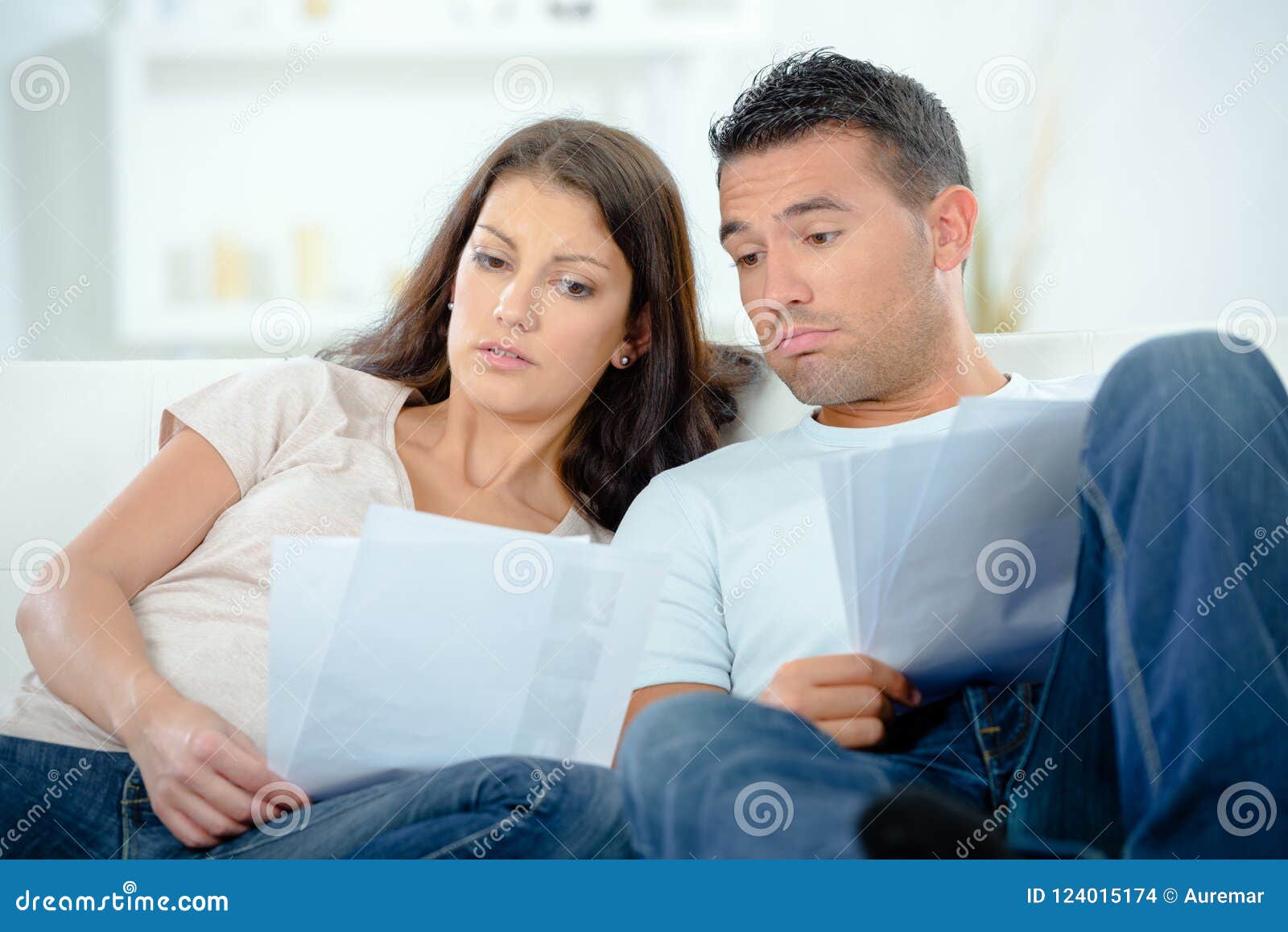 Worried Young Couple Discussing on Bills at Home Stock Photo - Image of ... Worried Young Couple Discussing on Bills at Home Stock Photo - Image of ...
