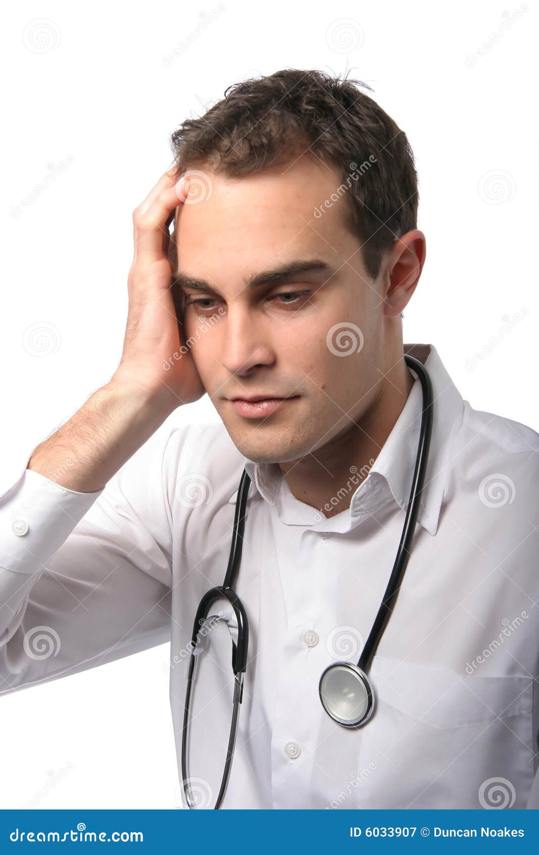 Worried Young Doctor stock image. Image of handsome, clinic - 6033907