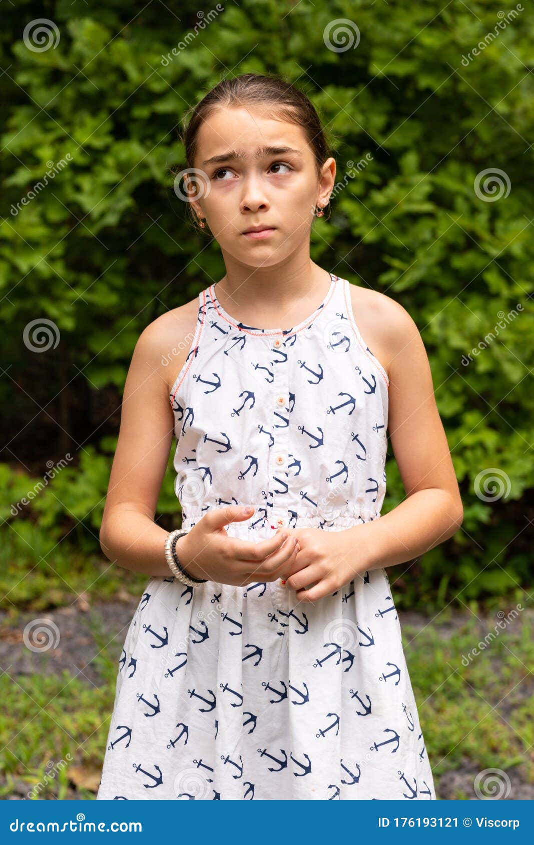 Worried Young Girl stock image. Image of hands, holding - 176193121