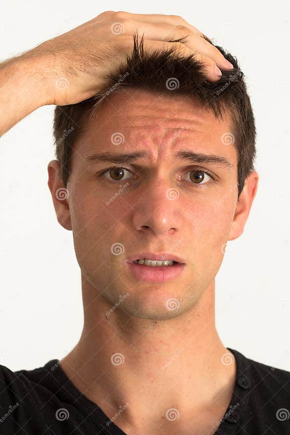 Worried Young Man with Hand on Face Stock Photo - Image of pain ...
