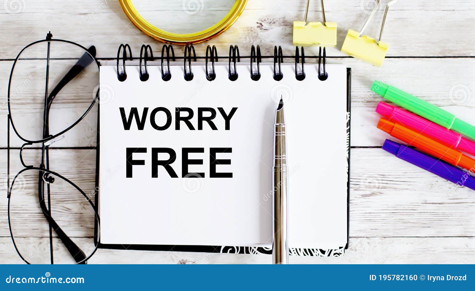 WORRY FREE Written in a Notebook on White Background with Office Tools ...