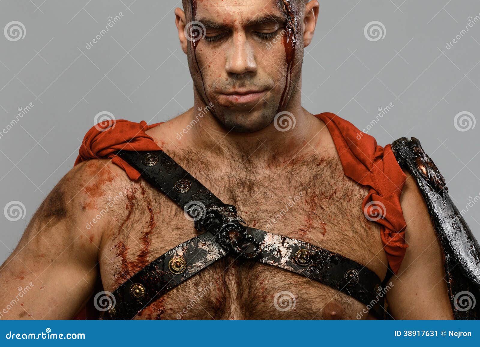 Wounded gladiator close-up stock image. Image of armor - 38917631
