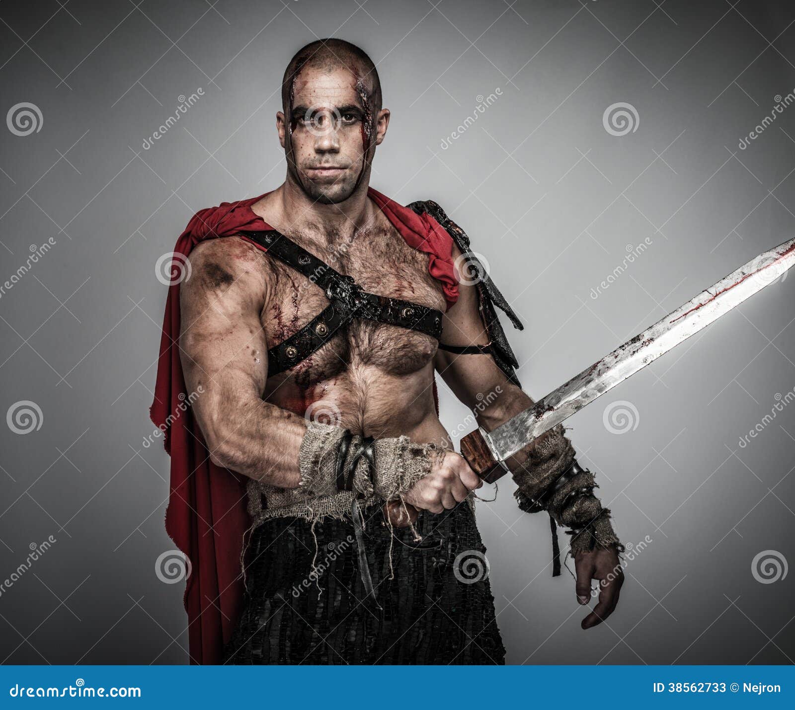 Wounded Gladiator with Sword Stock Image - Image of muscular, courage ...
