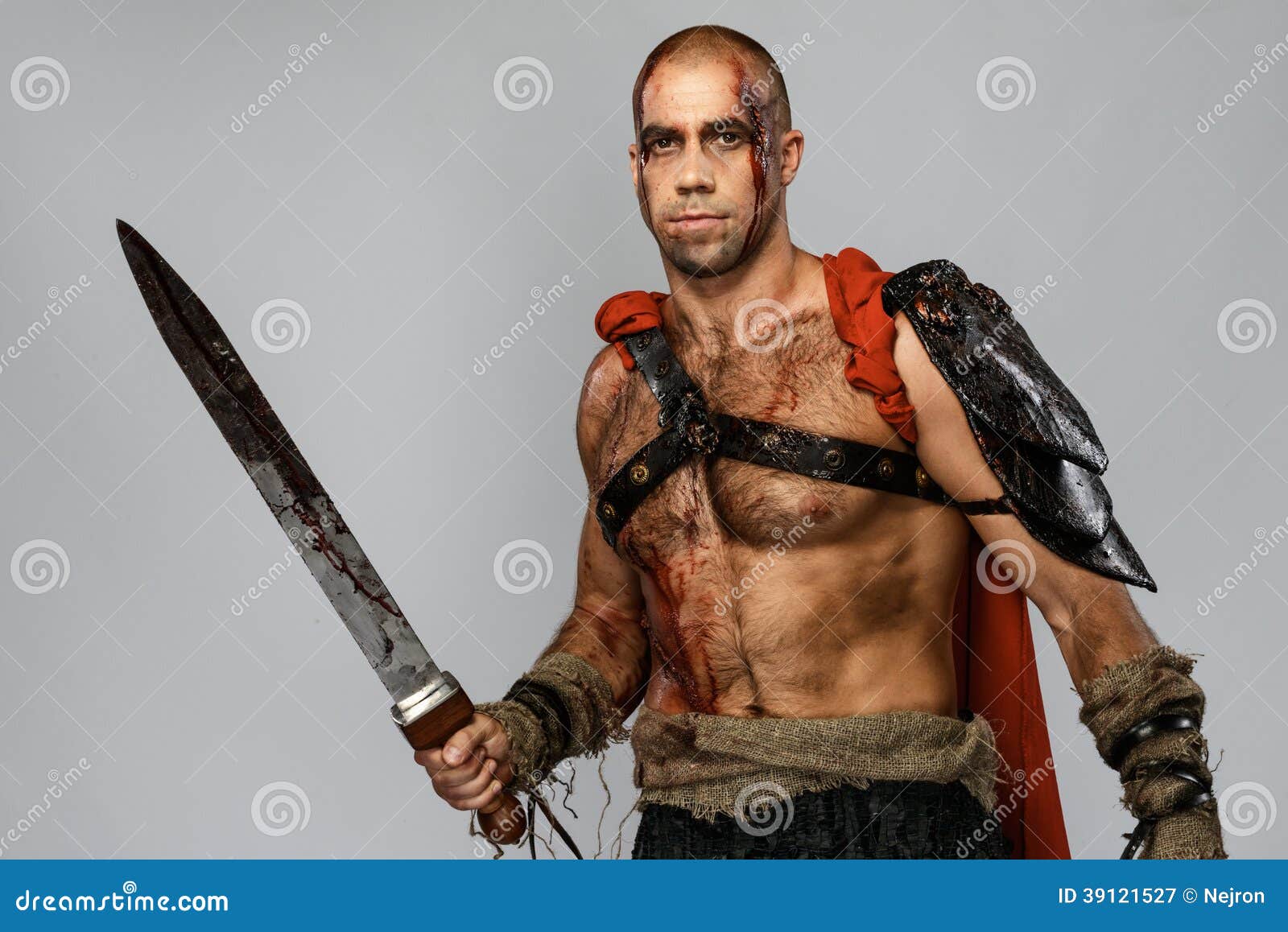 Wounded Gladiator with Sword Stock Image - Image of gladius, muscular ...