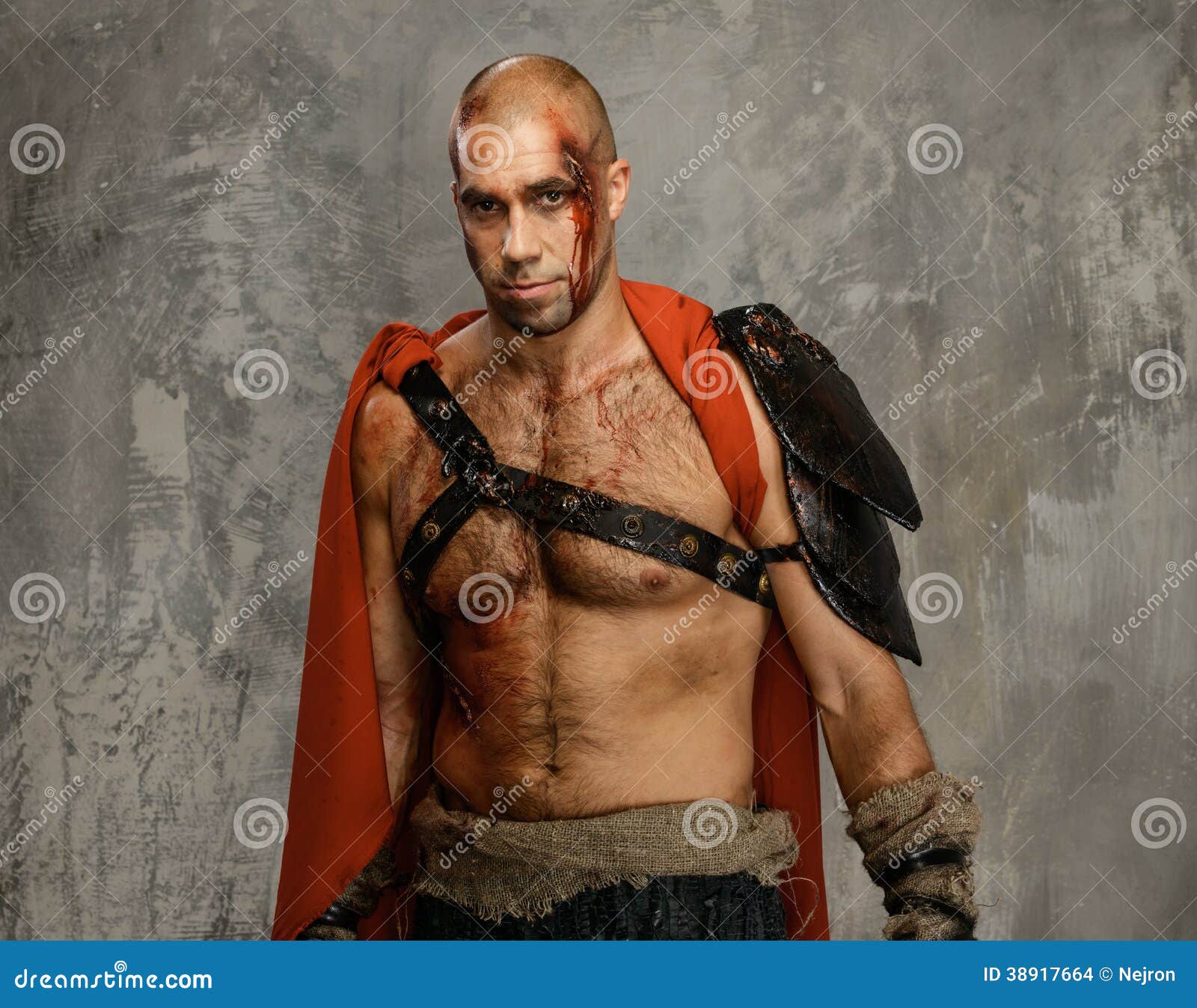 Wounded Gladiator with Sword Stock Photo - Image of spartan, legion ...