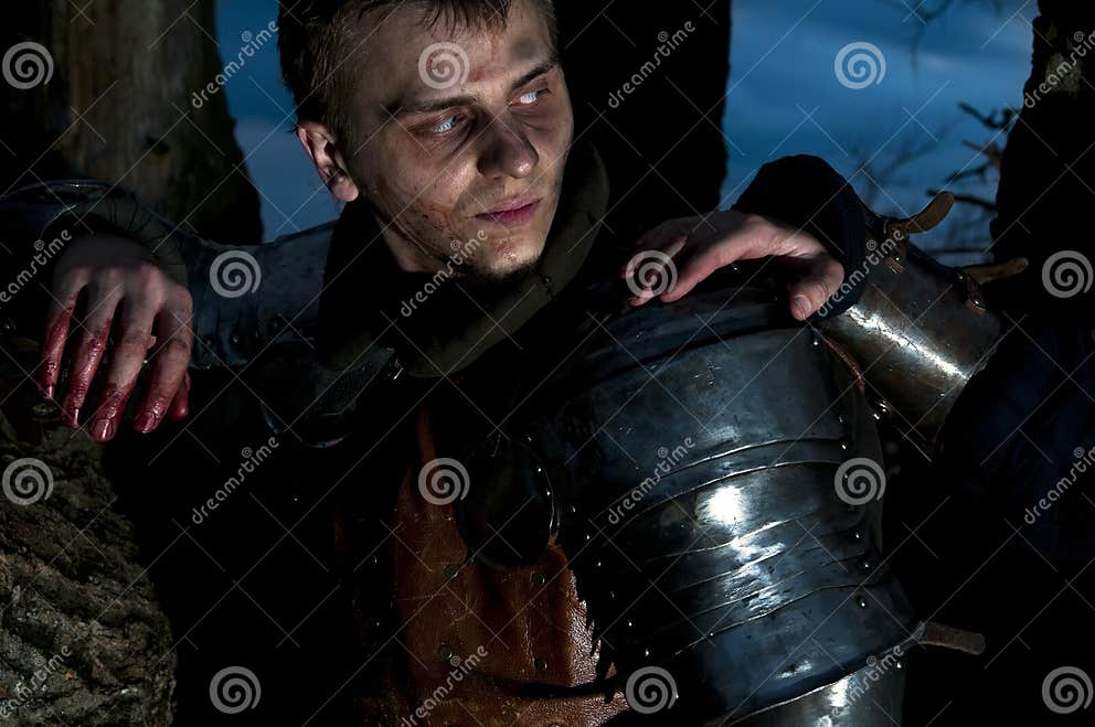 Wounded Knight Near the Tree Stock Image - Image of dirty, knife: 31574773