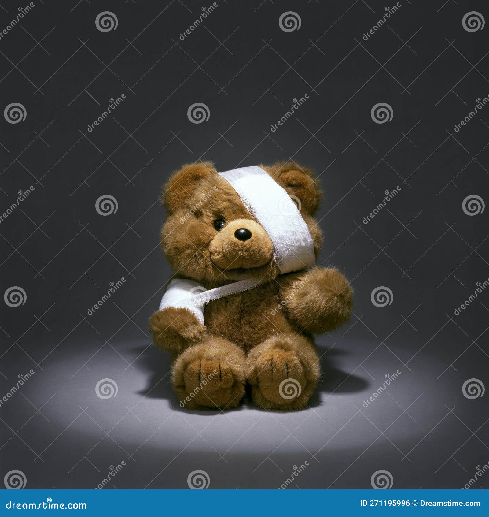 Wounded Toy Teddy Bear with Bandages and Sling Stock Photo - Image of ...