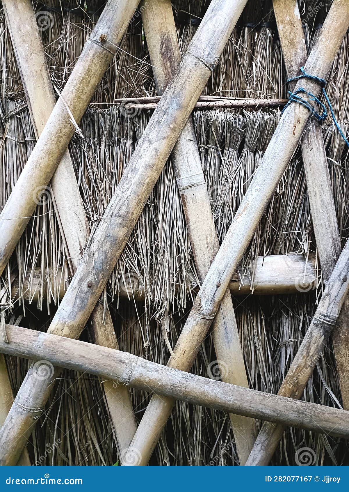 Woven Bamboo Grid Over Weathered Straw Thatch Abstract Vertical ...