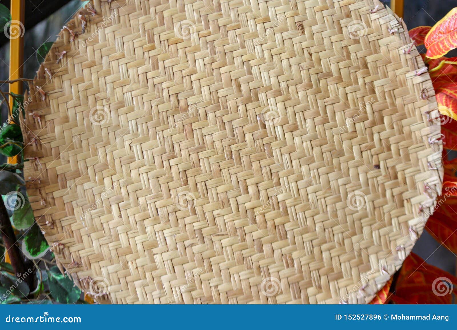 Woven Rattan in a Circle with a Flower Background Stock Photo - Image ...