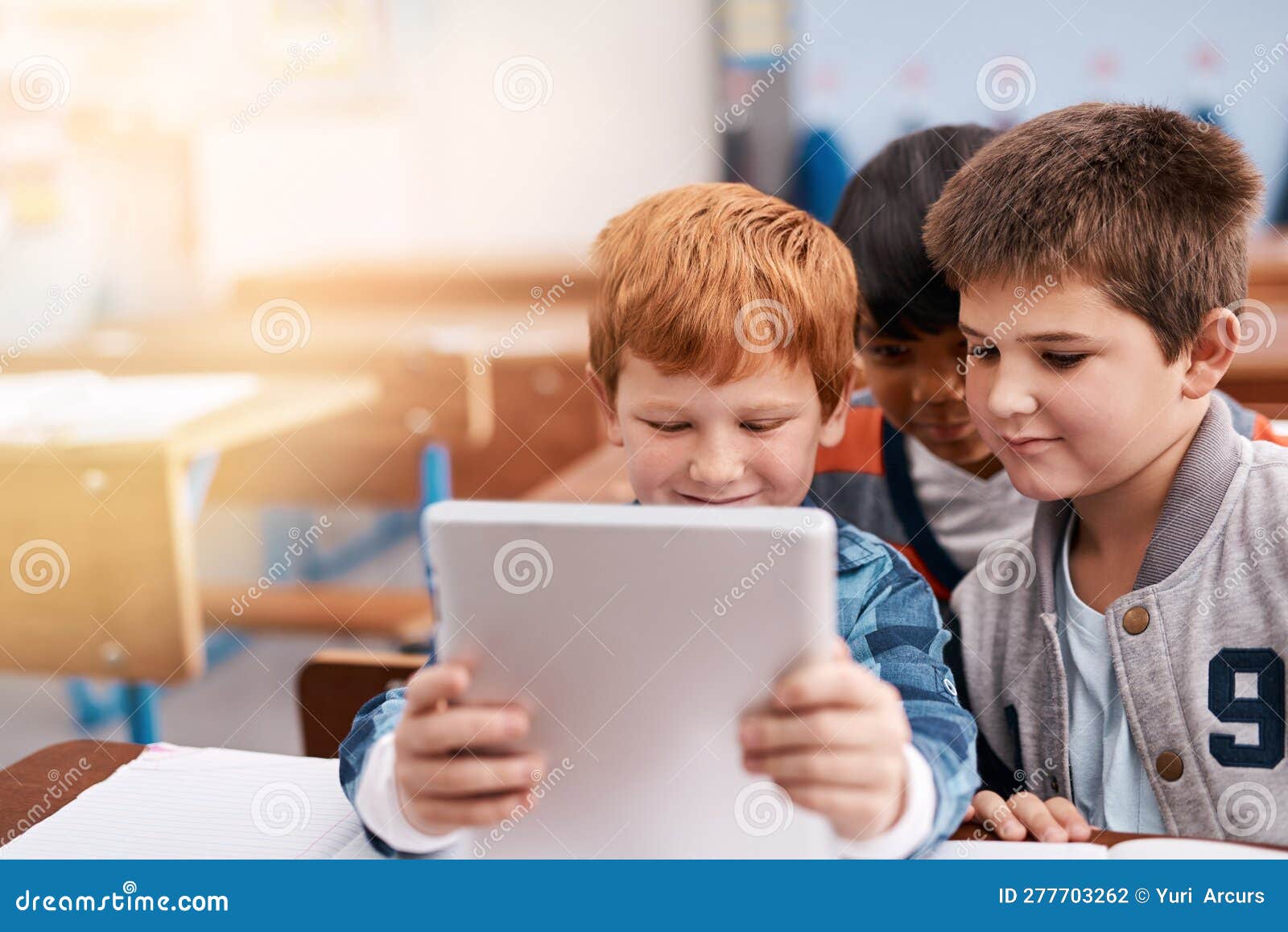 Wow this is Better Than a Book. Two Elementary School Children Browsing ...