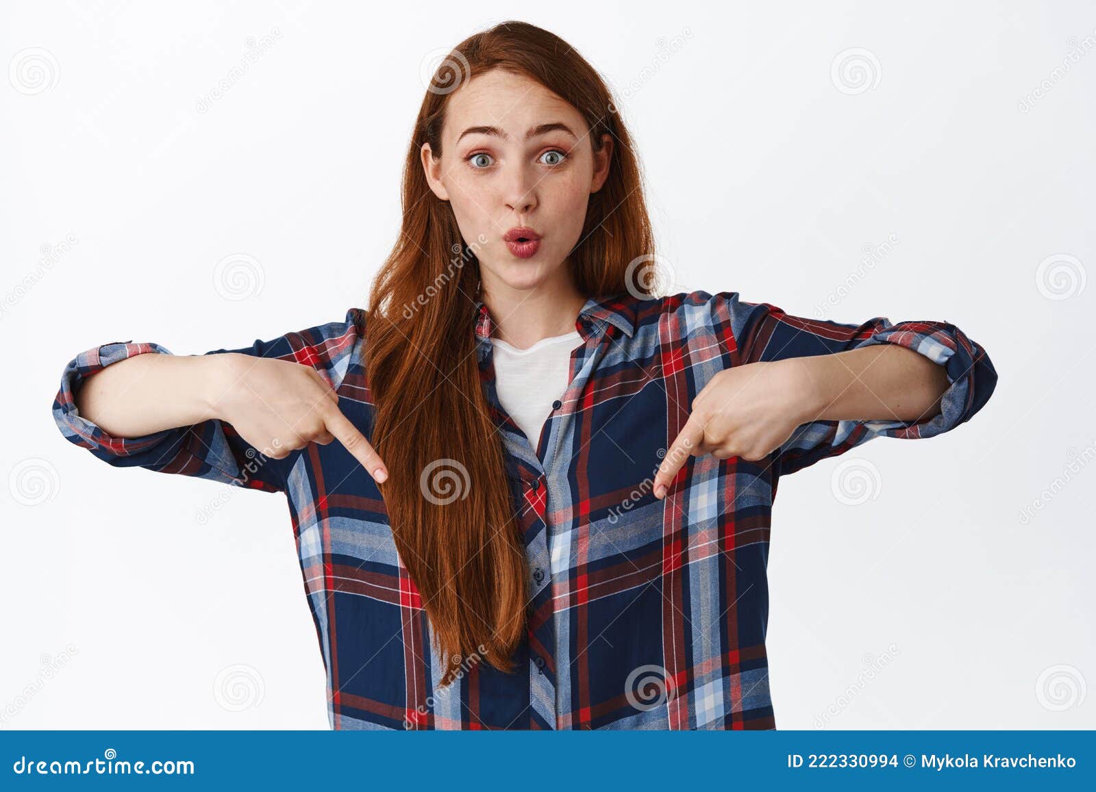 Wow Check This Out. Impressed Young Woman Pointing And Looking Left At ...