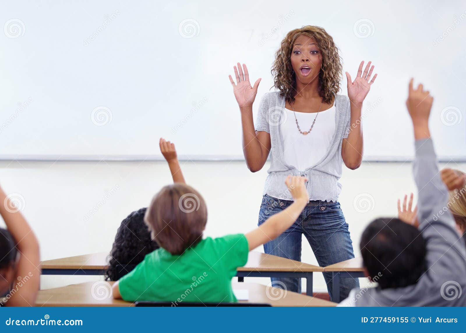 Wow, One at a Time Guys. a Young Teacher Standing at the Front of Her ...