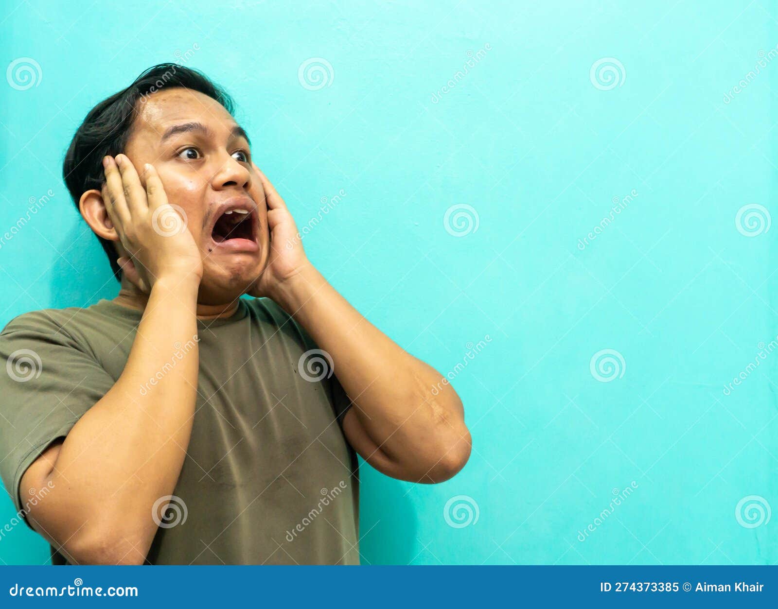 Wow and Shocked Face Expression of Young Asian Malay Man with Both Ears ...