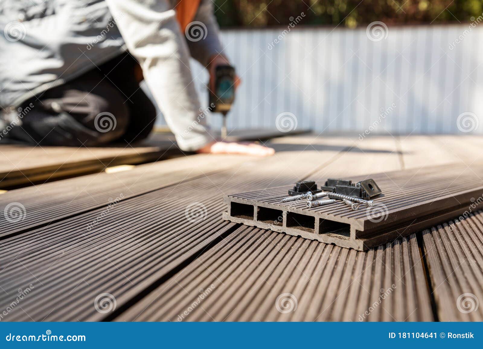 Wpc Terrace Construction - Worker Installing Wood Plastic Composite ...