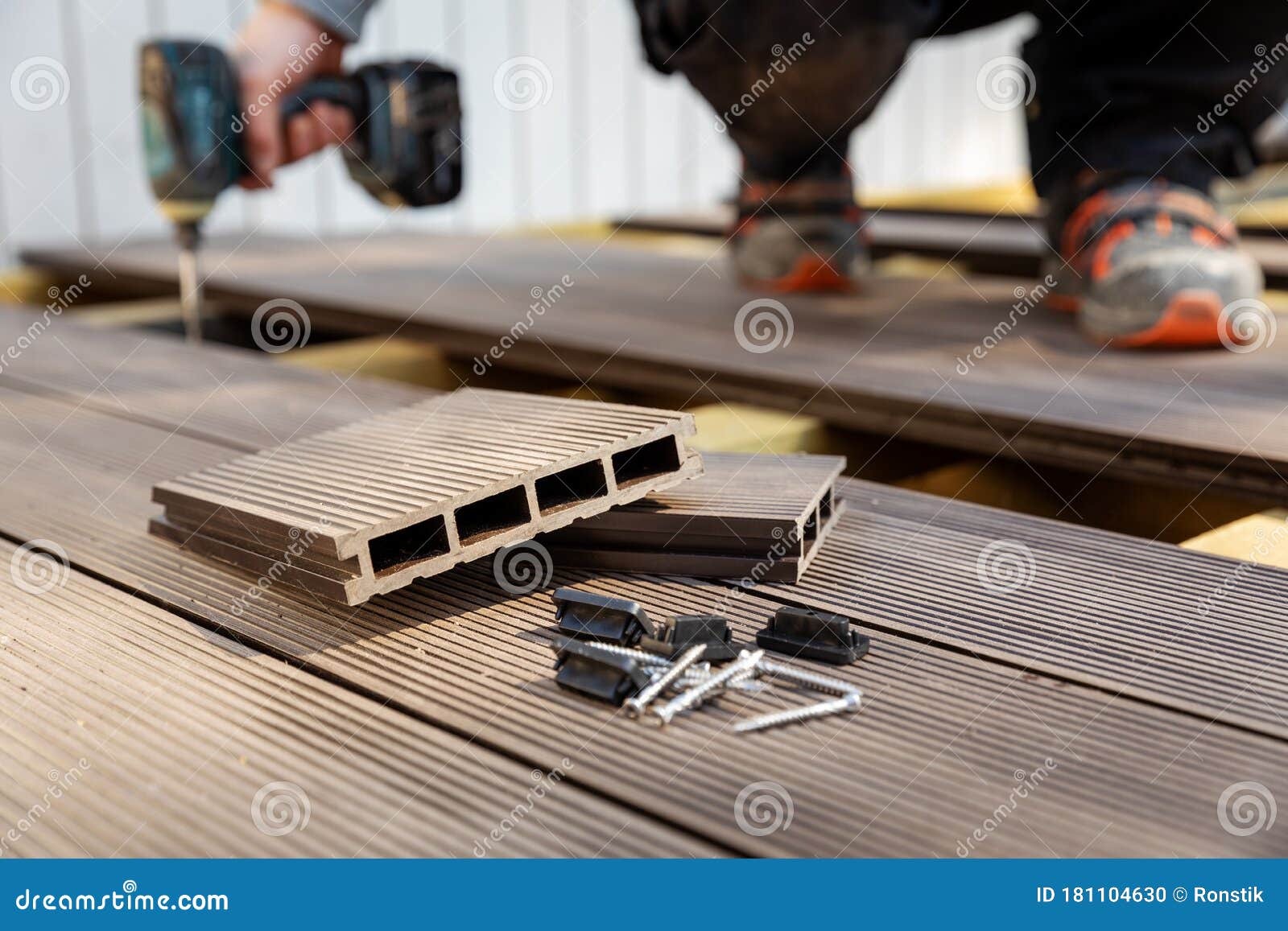 Wpc Terrace Construction - Worker Installing Wood Plastic Composite ...