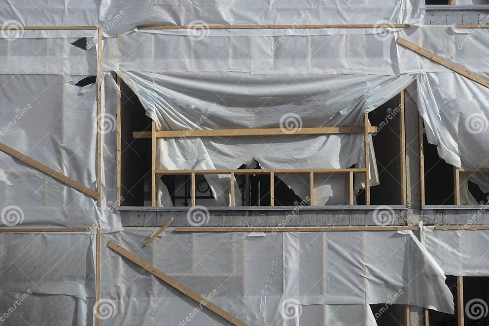 Wrapped facade of building stock image. Image of window - 180452363