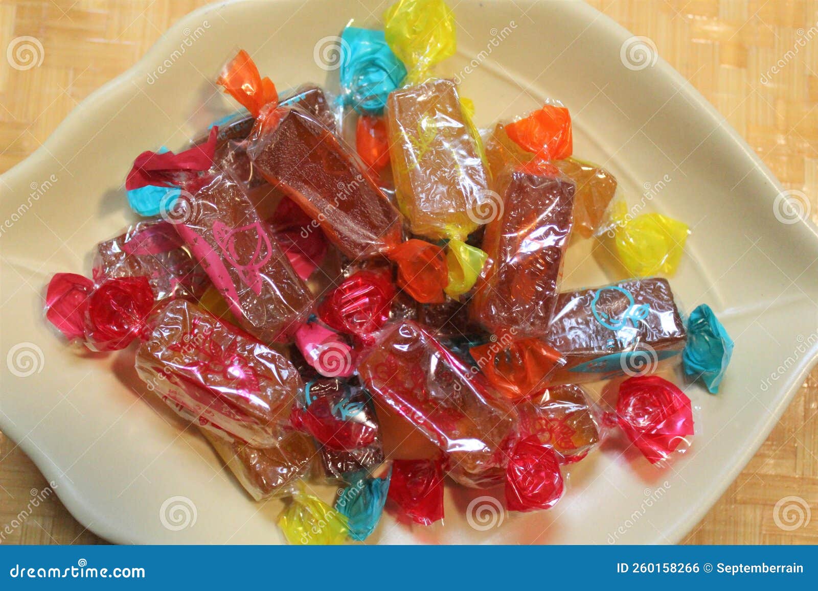 Wrapped Fruit Flavored Candies Stock Photo - Image of dish, bunch ...