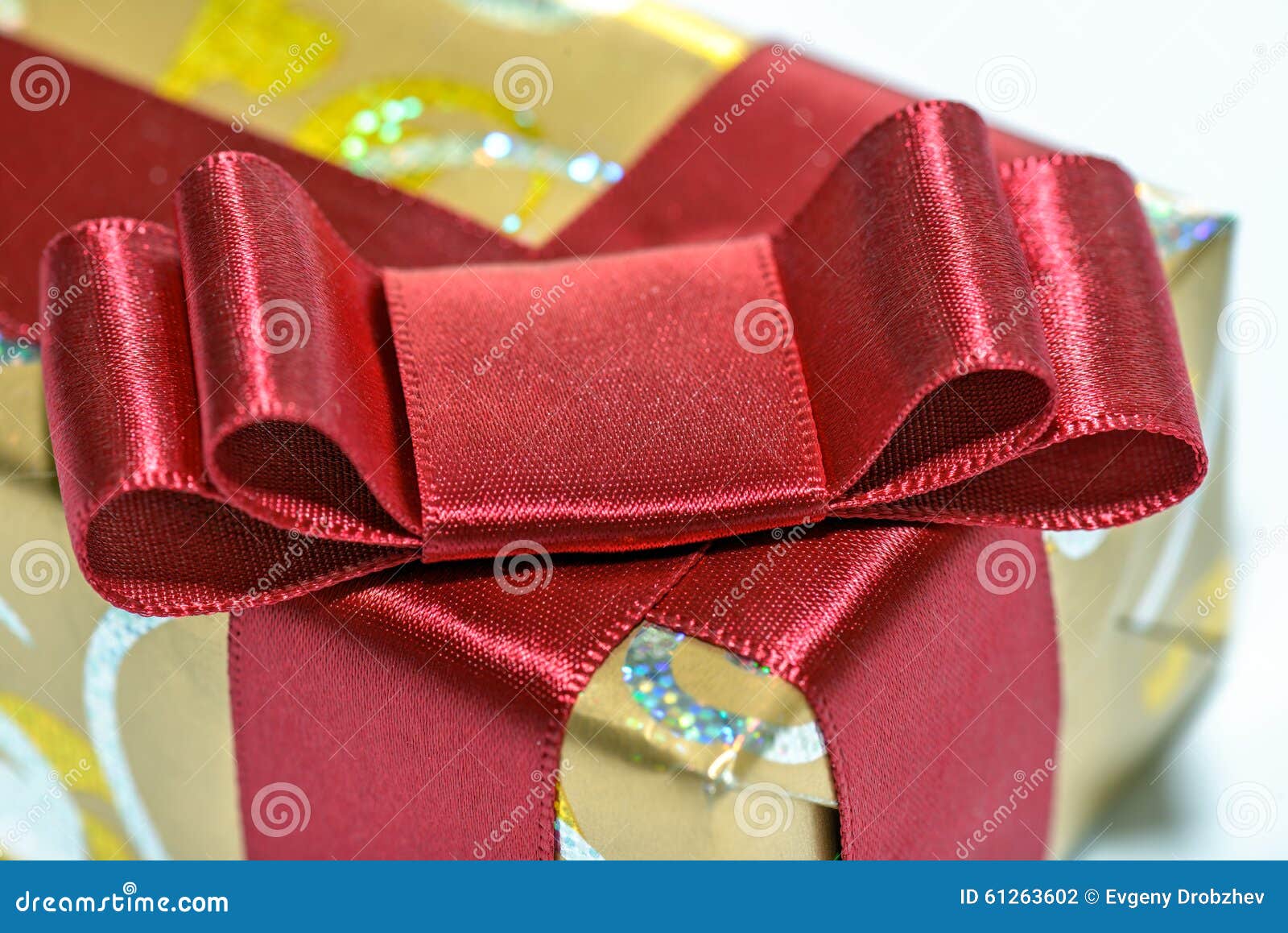 Wrapped Gift with Red Ribbon and Bow Stock Photo - Image of present ...