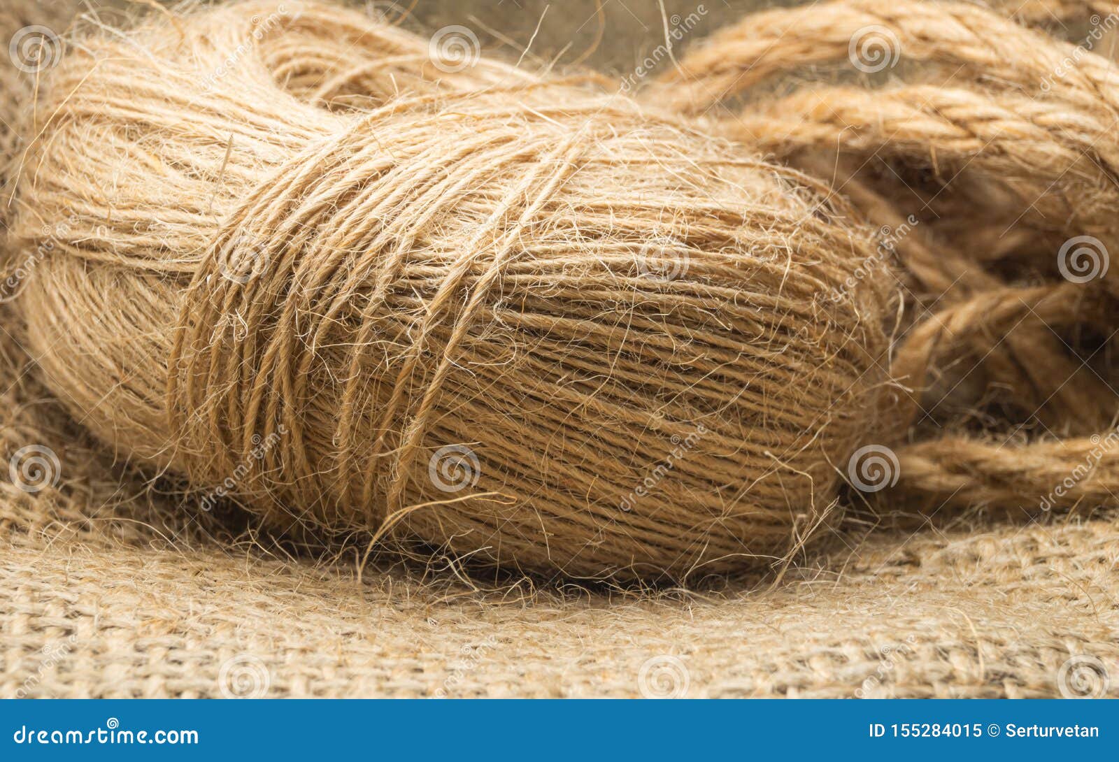 Wrapped Linen Rope and Natural Linen Fabric Texture. Close Up Shooting ...