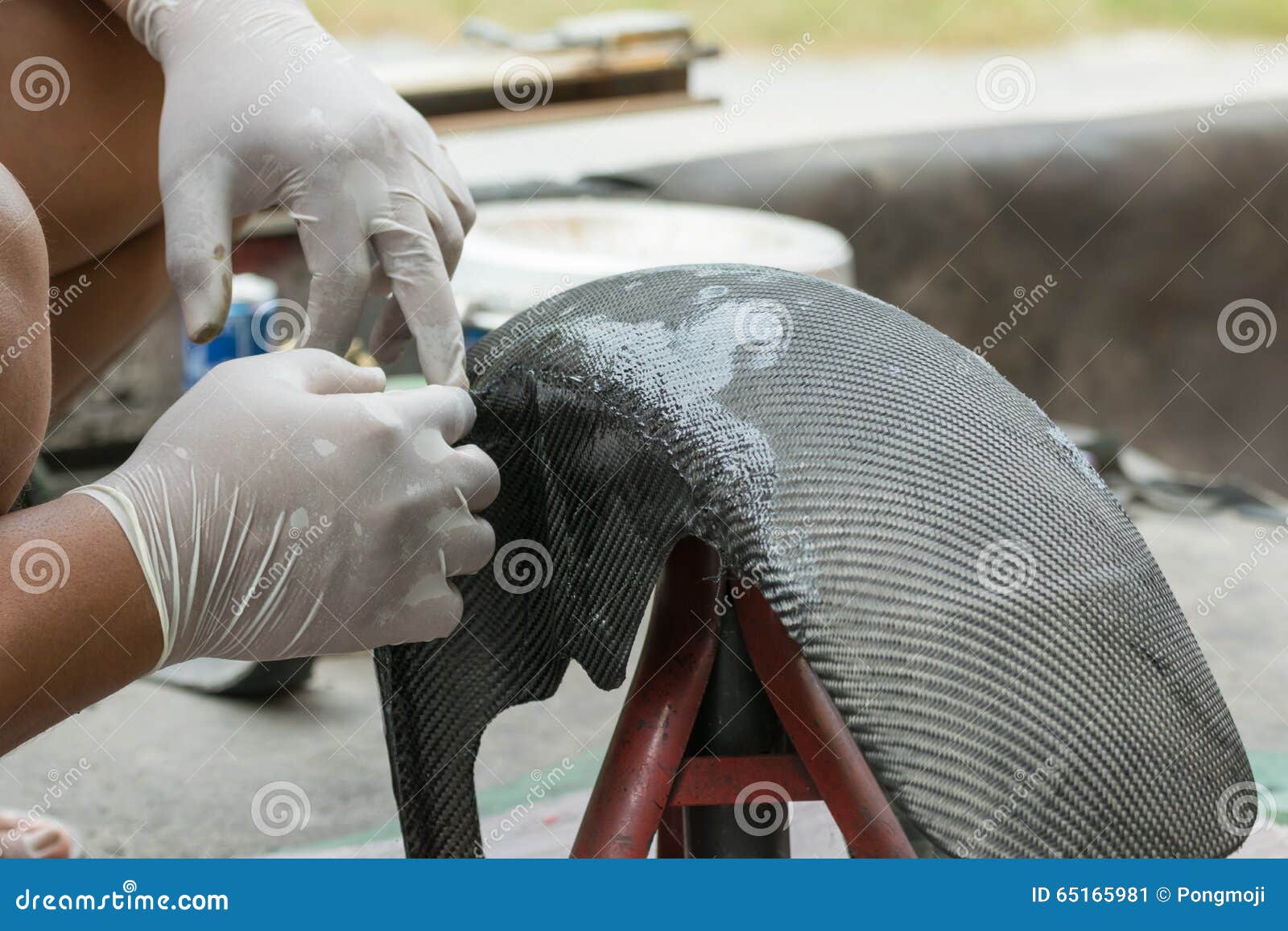 Wrapping Carbon Fiber or Kevlar Stock Image - Image of garage, dark ...
