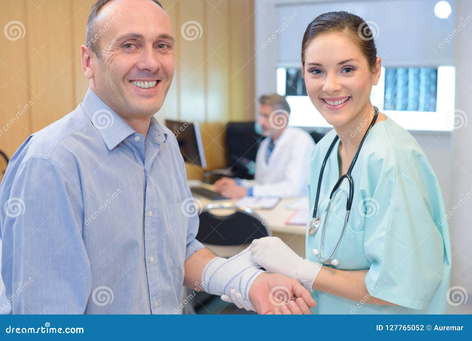 Wrapping the fracture arm stock photo. Image of recovery - 127765052