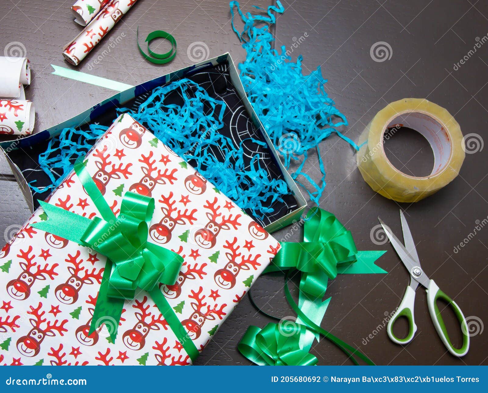 Wrapping Gift with Scissors, Tape and Paper Stock Photo - Image of ...