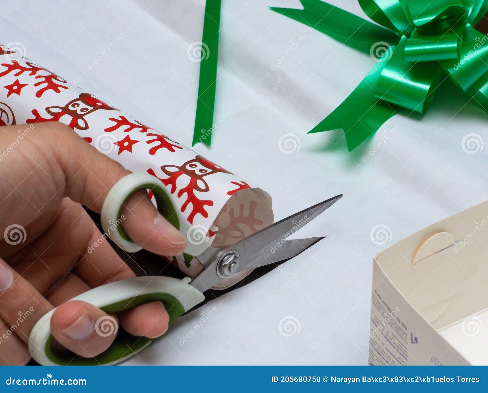 Wrapping Gift with Scissors, Tape and Paper Stock Photo - Image of ...
