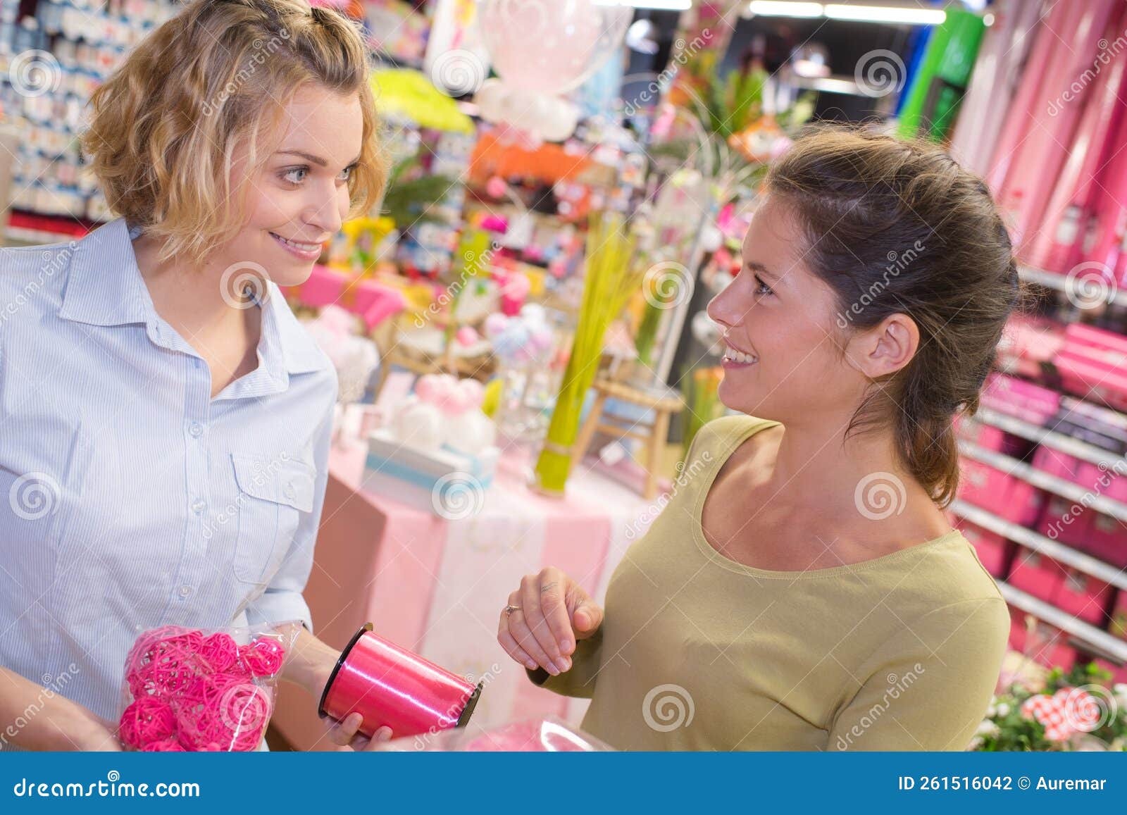 Wrapping presents in shop stock photo. Image of golden - 261516042