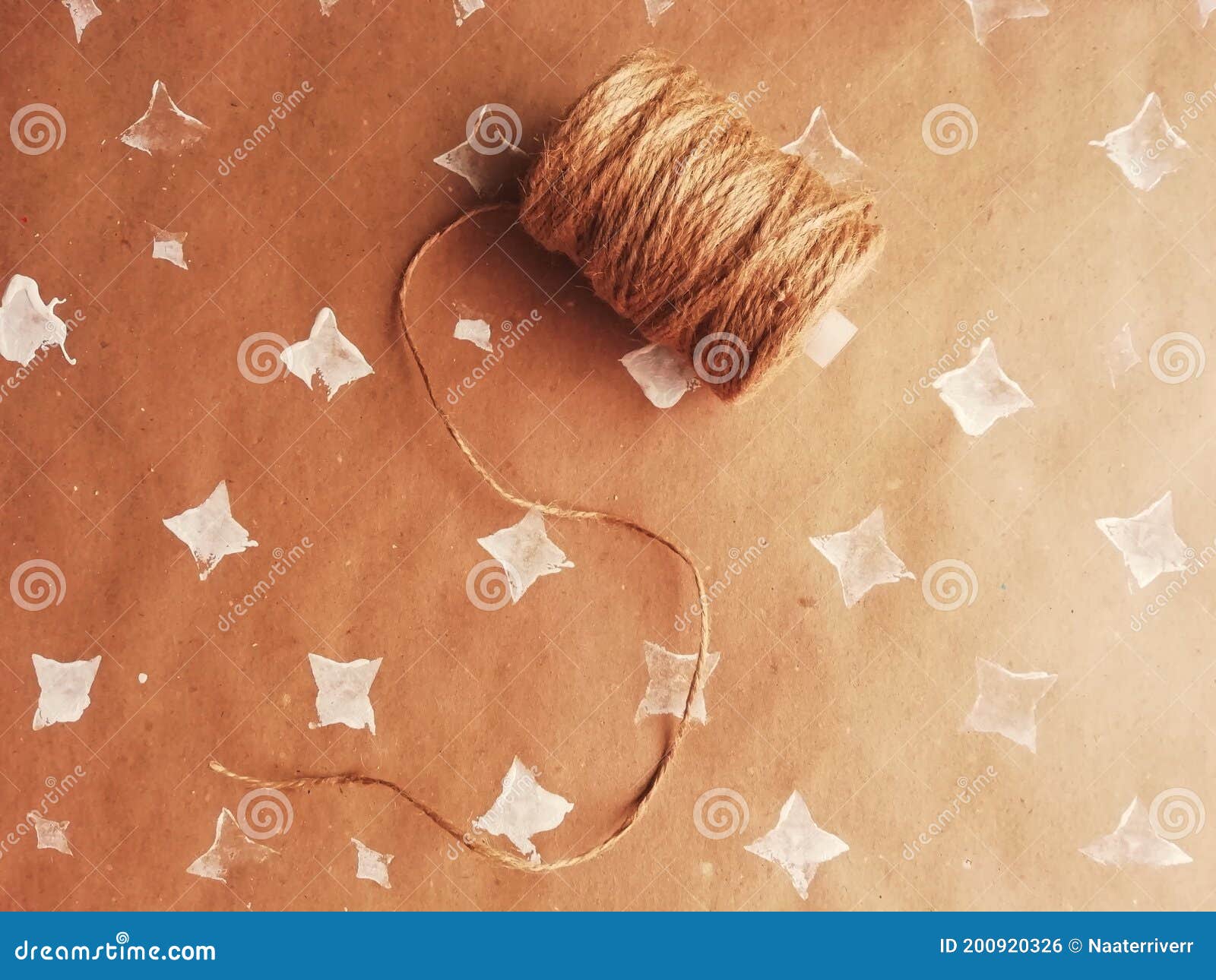Wrapping Rope on Craft Background with White Stars Stock Photo - Image ...
