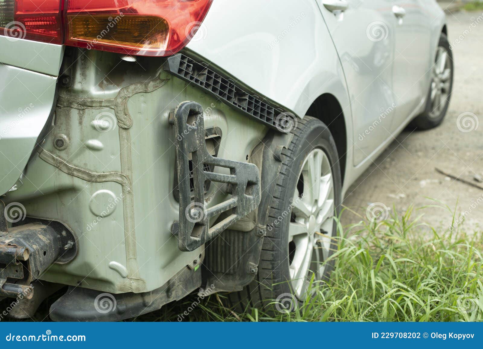 A Wrecked Car in the Back. Damaged Car Stock Photo - Image of broken ...