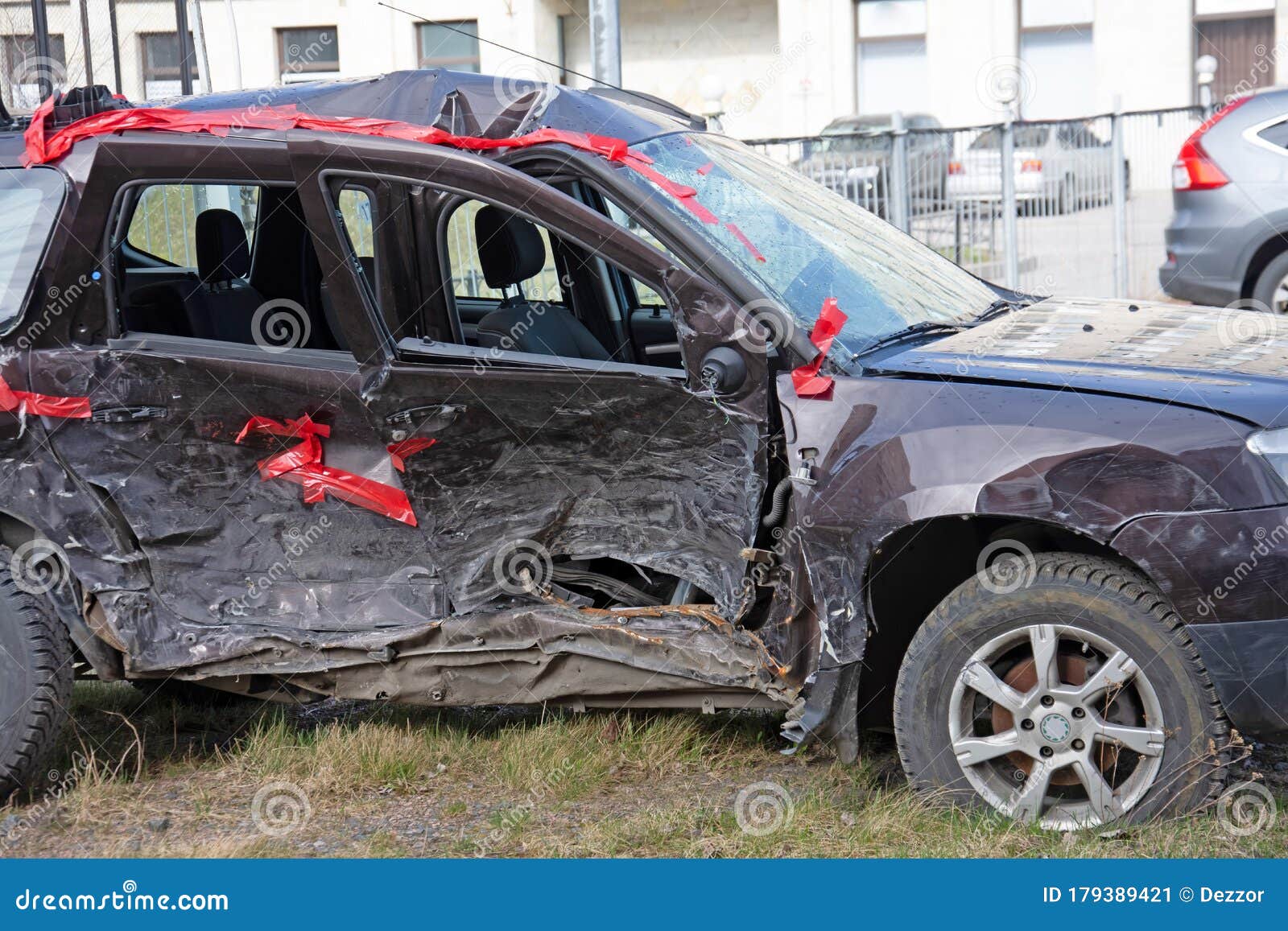 Wrecked Crumpled Car from the Right Side after a Severe Accident with a ...