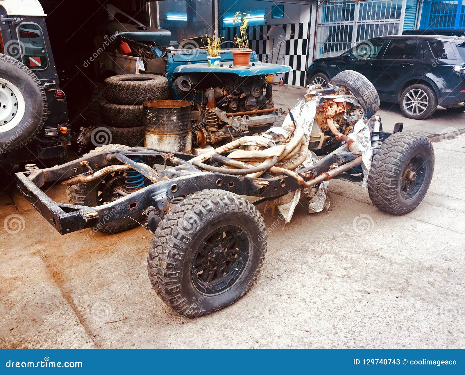 A Wrecked Junk Convertible Modified Suv Car in the Street Stock Image ...