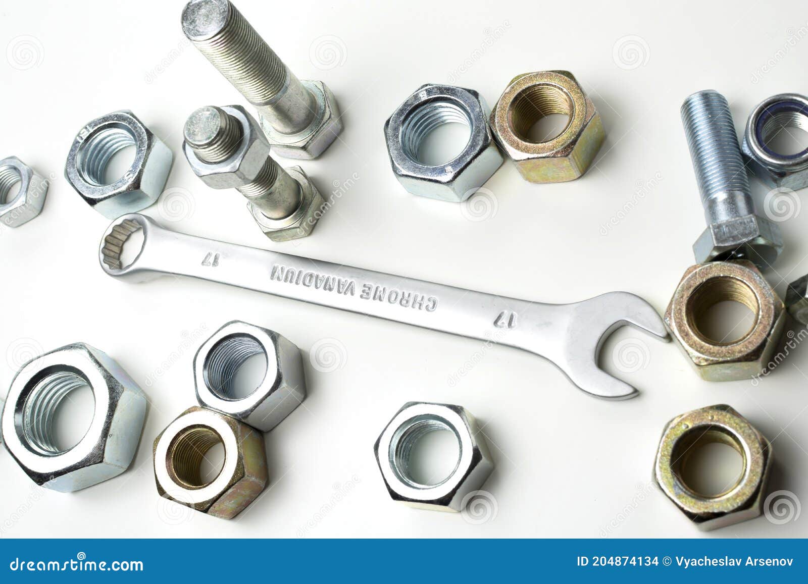 Wrench with Fasteners on a White Background Stock Photo - Image of ...