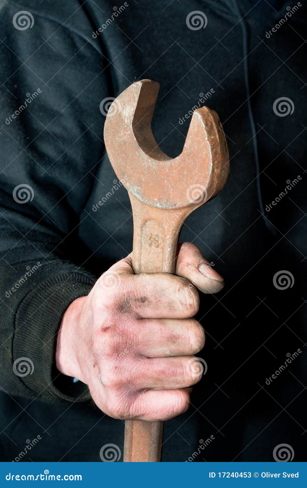 Wrench in hand stock image. Image of metallic, hand, rusty - 17240453