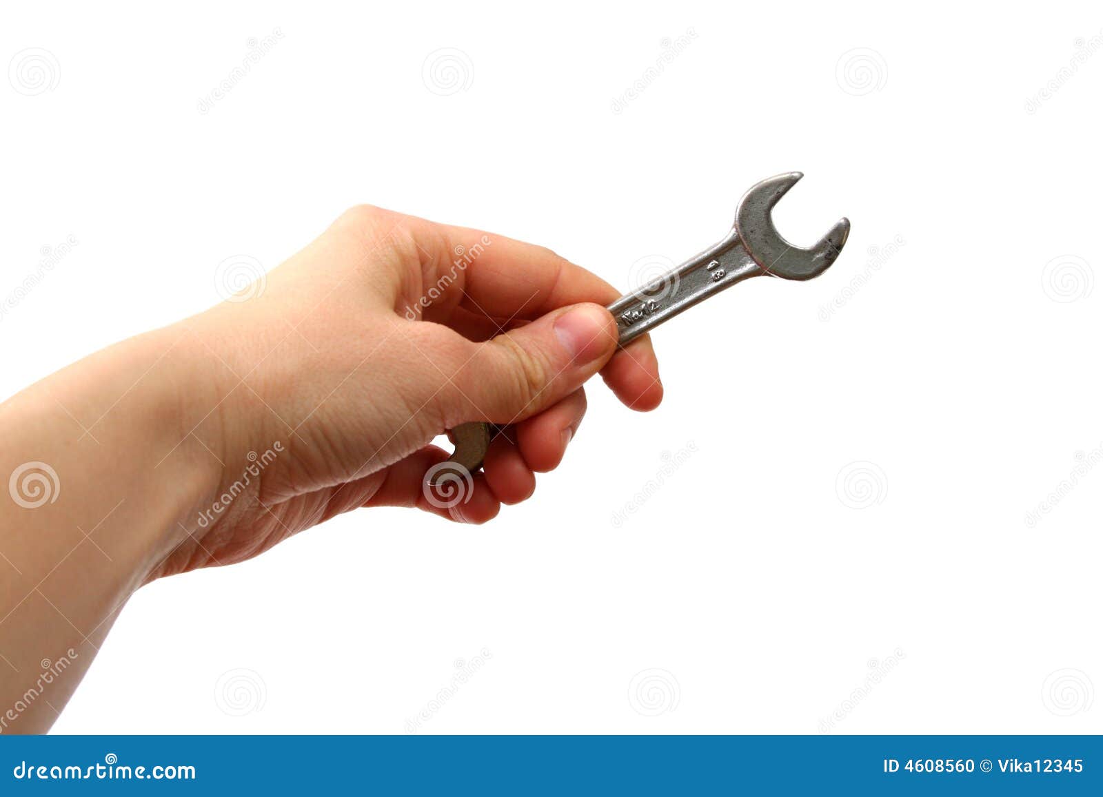 Wrench in hand stock photo. Image of iron, build, steel - 4608560