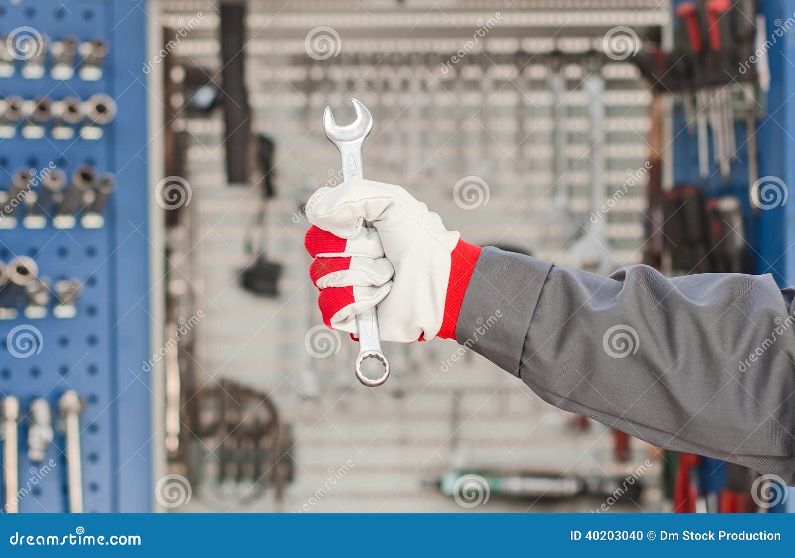 Wrench in hand. stock photo. Image of spanner, chrome - 40203040