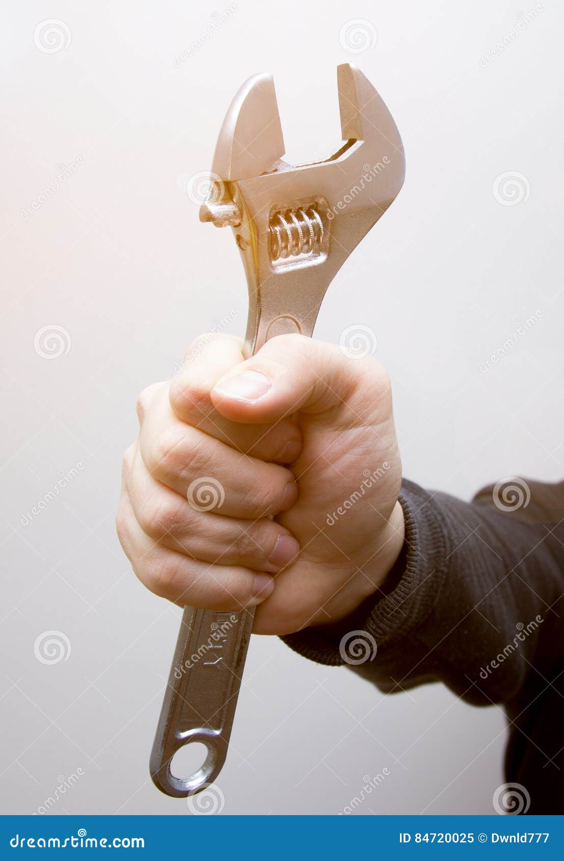 Wrench in hand stock image. Image of mechanic, spanner - 84720025