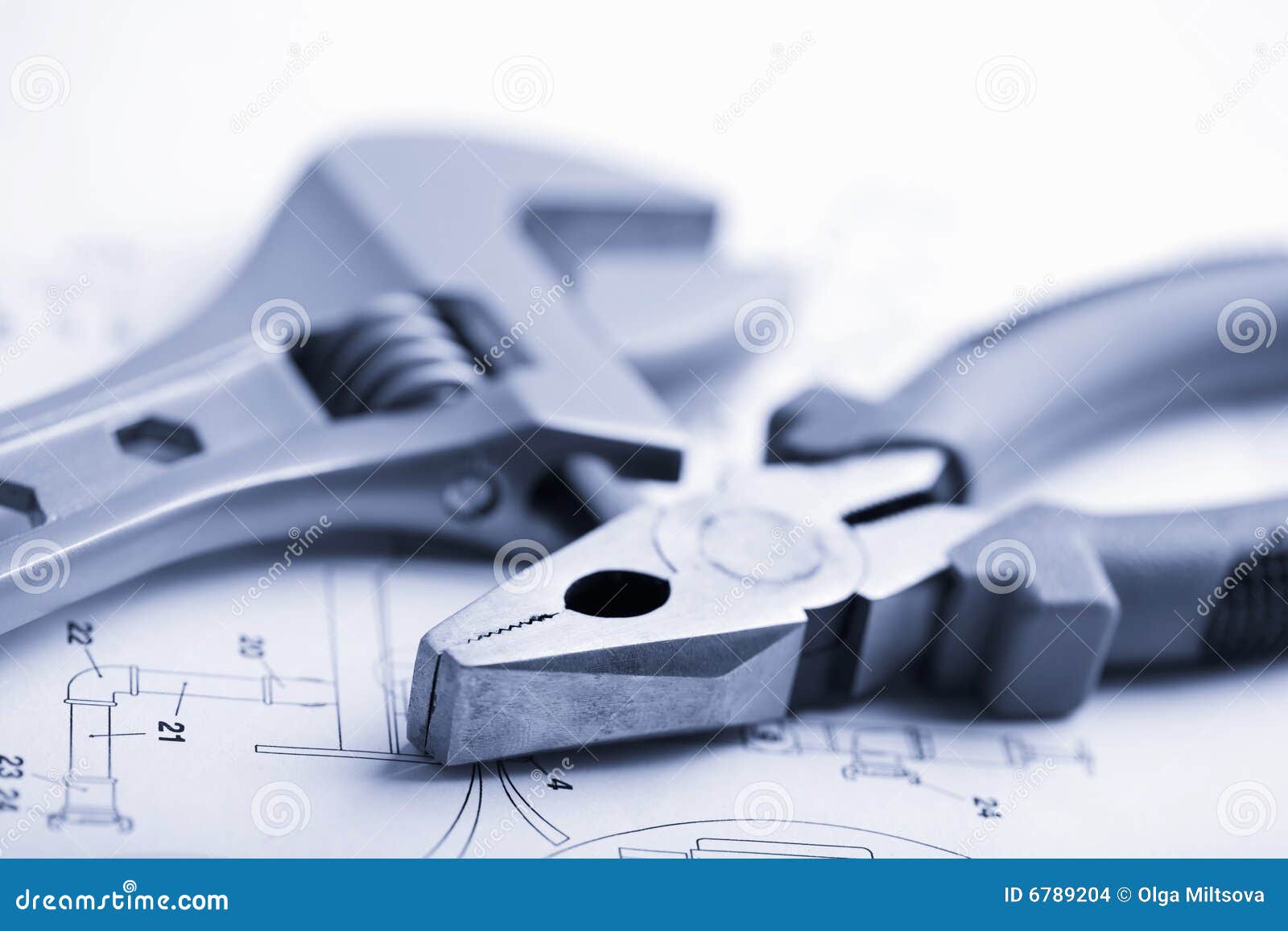 Wrench and Pliers Over Technical Drawing Stock Photo - Image of builder ...
