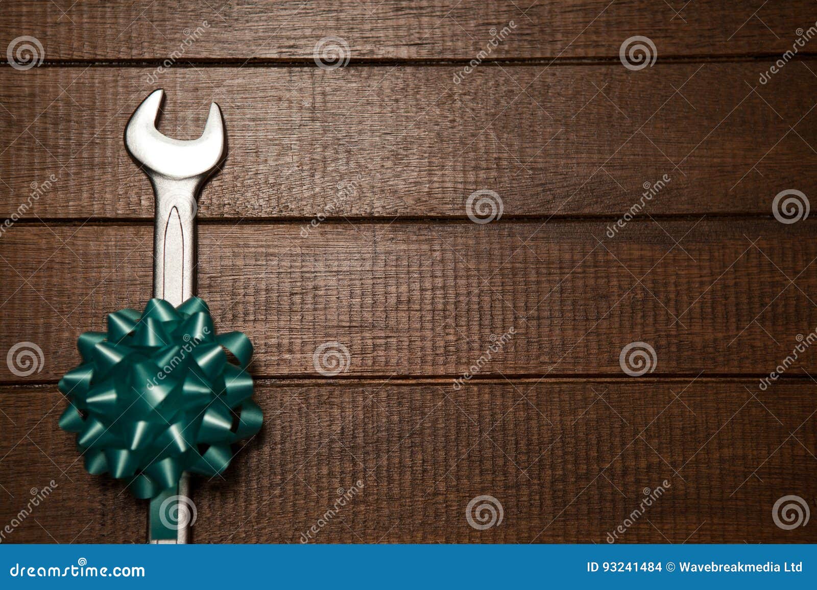 Wrench with Ribbon on Table Stock Photo - Image of tool, hand: 93241484