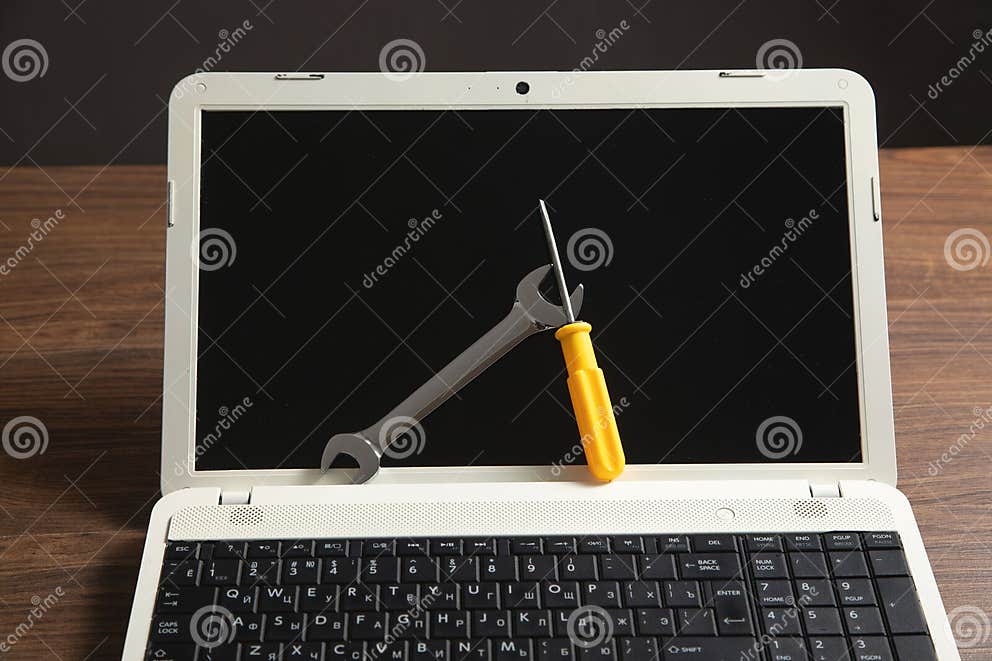 Wrench and Screwdriver with a Laptop Computer. it Service. Support Stock Image - Image of ...