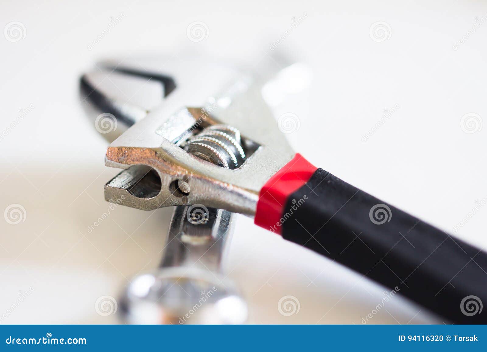 Wrench on wooden table stock photo. Image of metal, wrench - 94116320