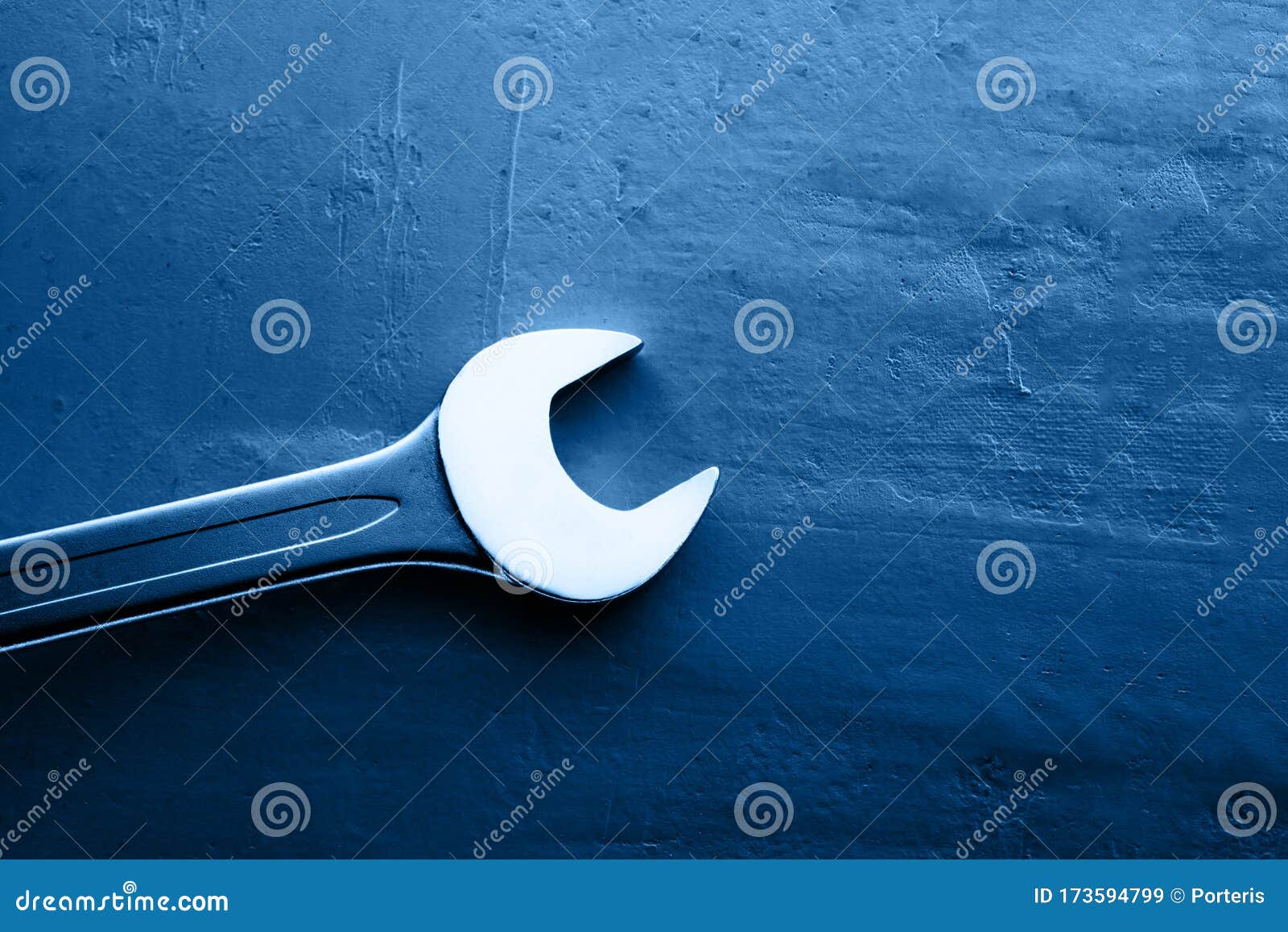 Wrenches on a Blue Textured Background with Purple Backlight Stock ...