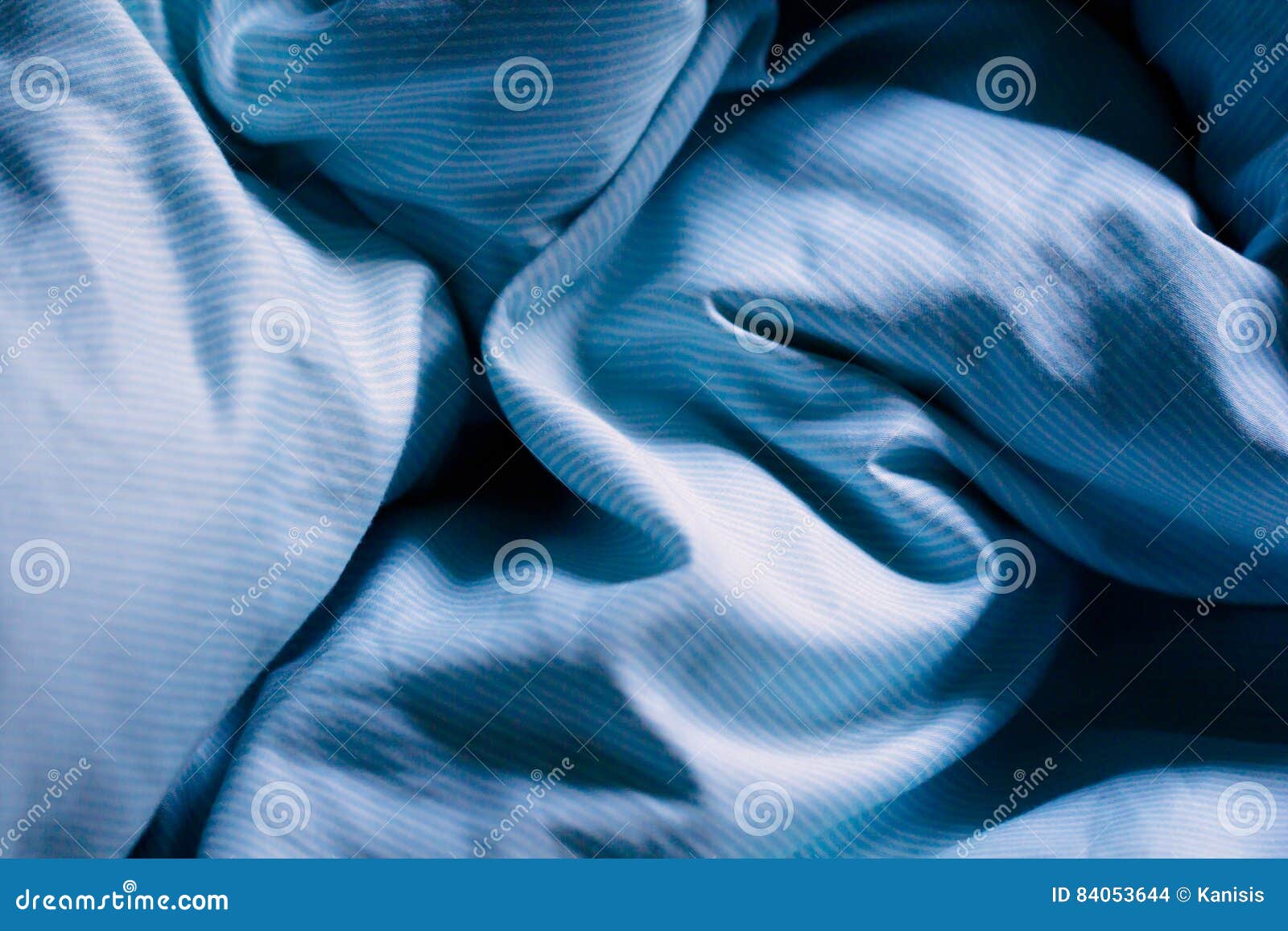 Wrinkled Blue Bed Sheets on a Morning As a Background Stock Photo ...