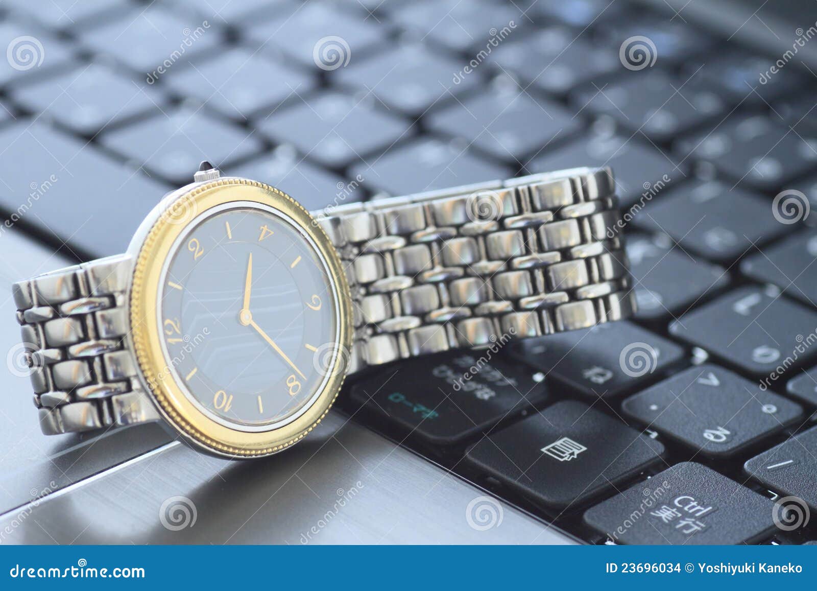 A Wrist Watch Over Keyboard Stock Photo - Image of digital, close: 23696034